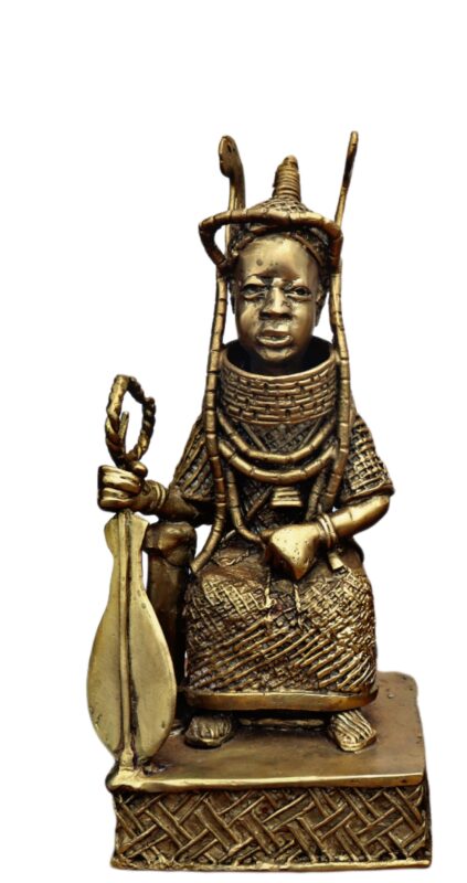 A seated Oba (King) in full regalia | Nenafrika